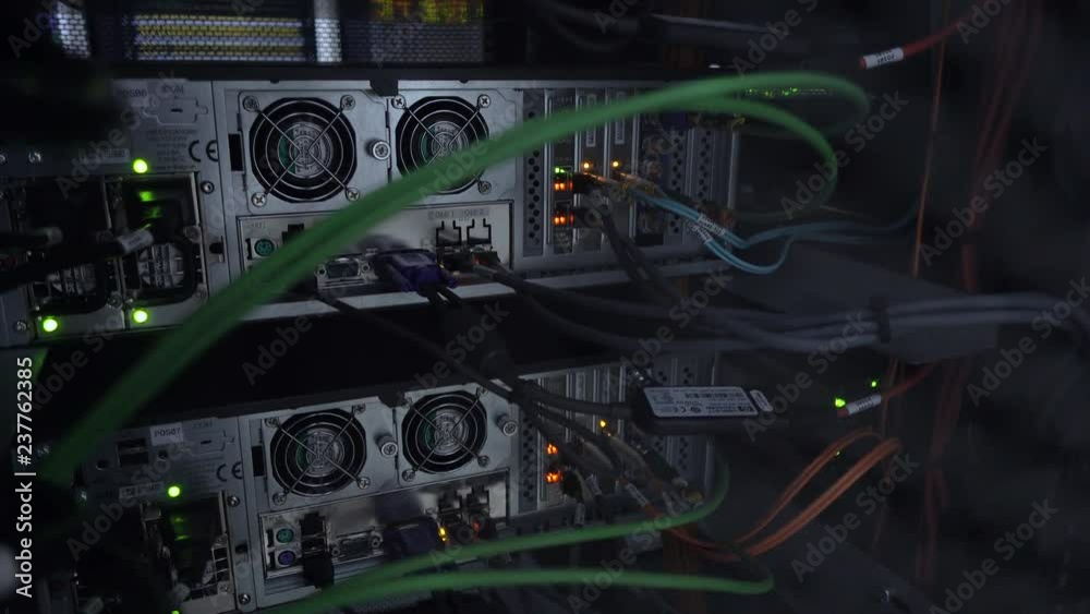 Stockvideo Back panel of powerful servers installed in the rack of the ...