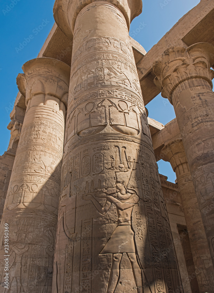 Ancient egyptian hieroglyphic carvings on columns in temple Stock Photo ...