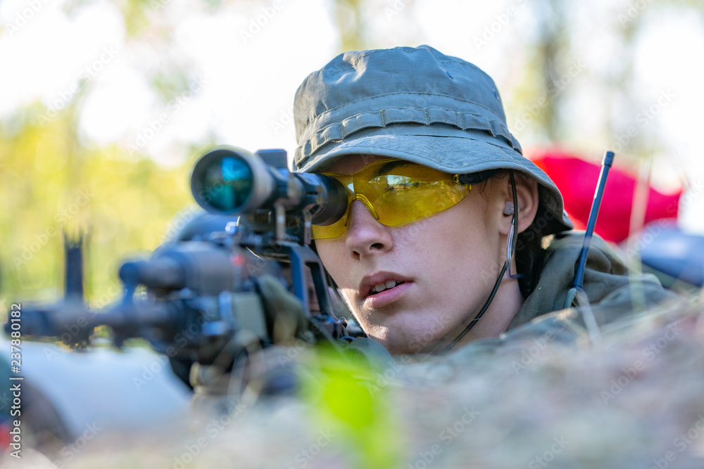 Sniper armed with large caliber, sniper rifle, shooting enemy targets ...