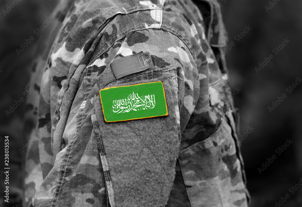 Flag of Hamas on soldier arm. Flag of Hamas on military uniforms ...