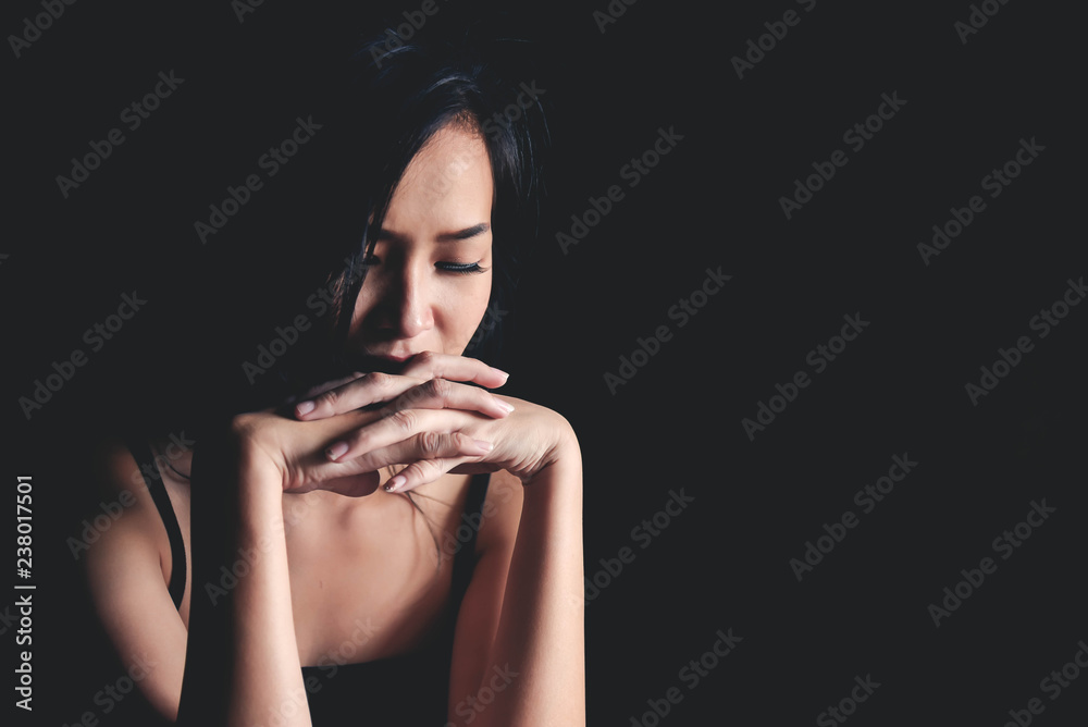 Sad depressed woman suffering from family life. women sitting in dark ...