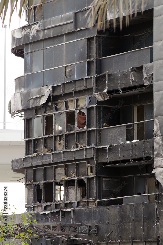 Building partialy destroyed by a fire which began in the basement. It ...