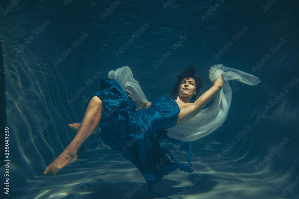Girl In Dress Underwater