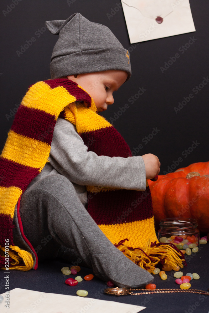 Little baby boy is reading a magic book Stock Photo | Adobe Stock
