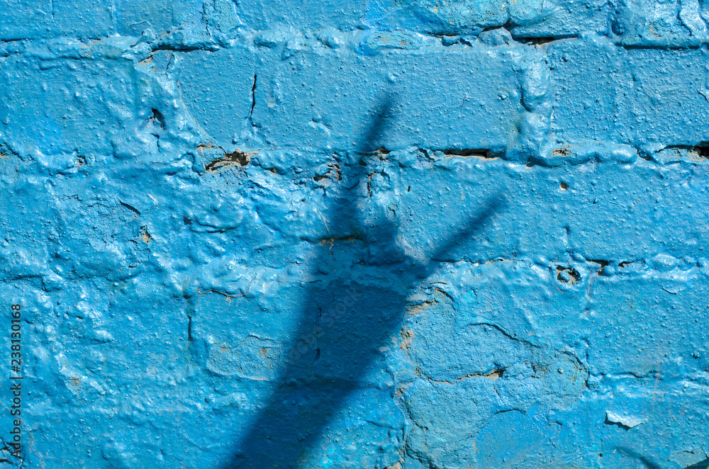 Shadow of person hand is showing a That rocks gesture sign over the ...