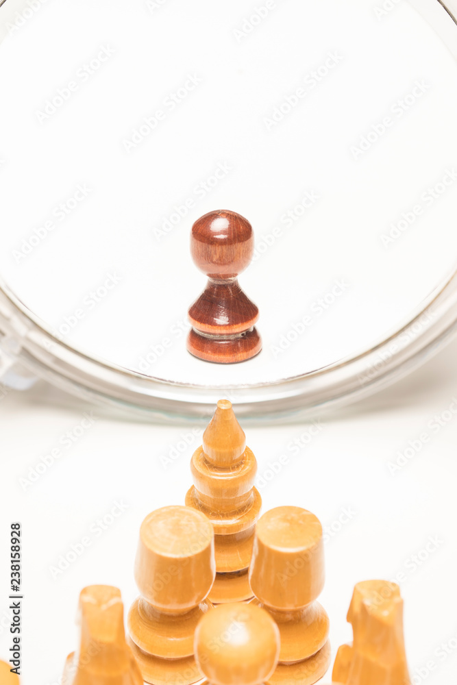 Chess pieces facing mirror. Business and motivational concepts. High ...