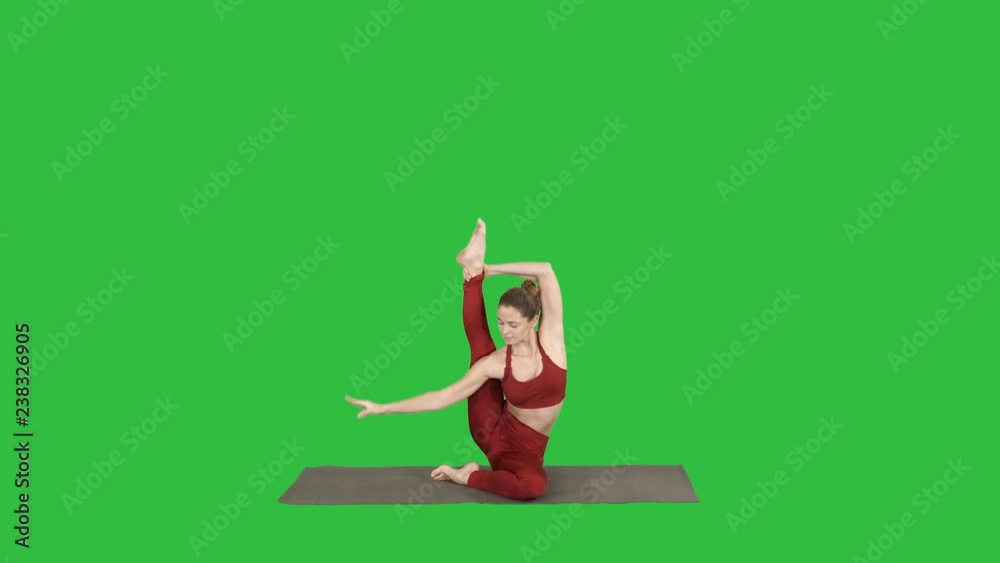 Sporty yogi girl doing fitness practice, stretches, yoga asana ...