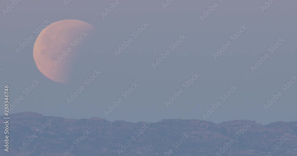 Lunar Eclipse as seen in Los Angeles, California Stock Video | Adobe Stock