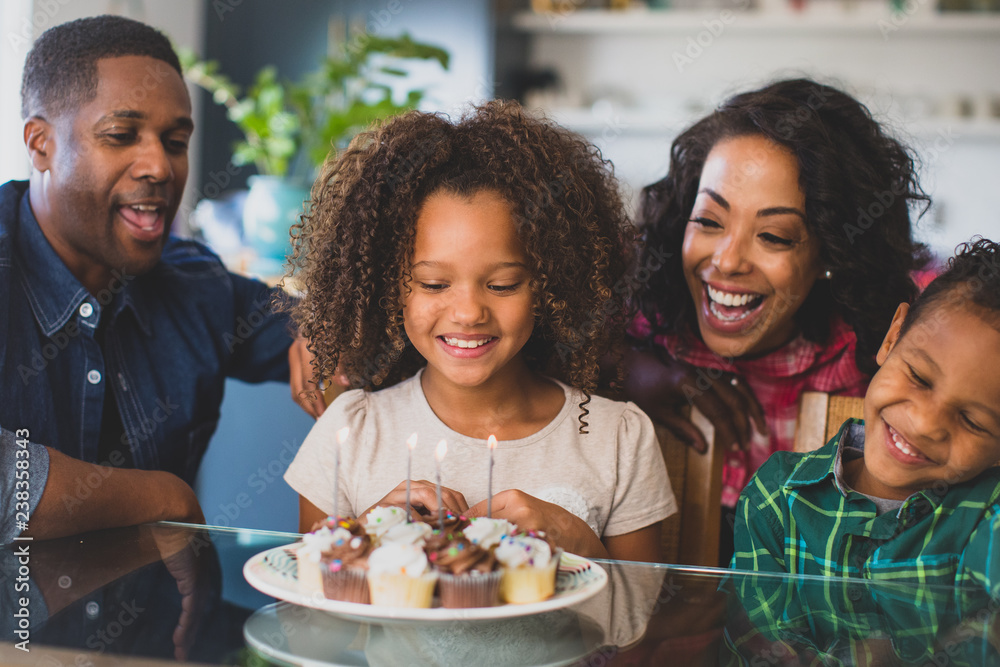 African American family celebrating a birthday Stock Photo | Adobe Stock
