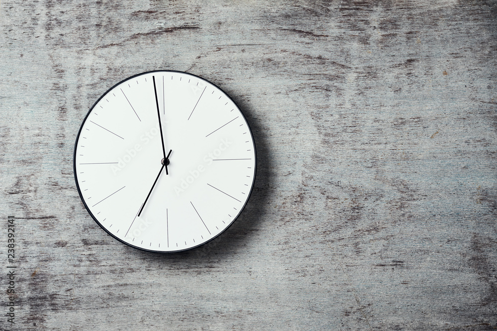 Classic round wall clock on a wooden background with copy space Stock ...