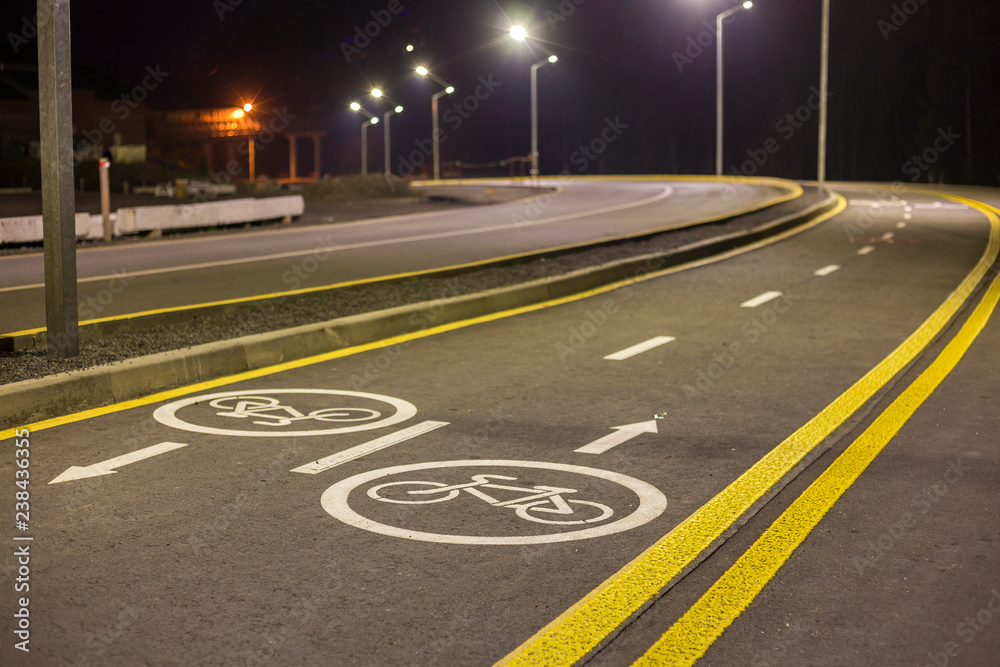 Bicycle Road Markings and Signs. Illuminated bicycle lane travel lane ...