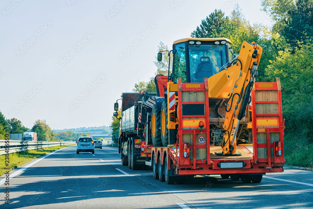 Truck trailer transporter with hauler carrying tractor road Slovenia ...