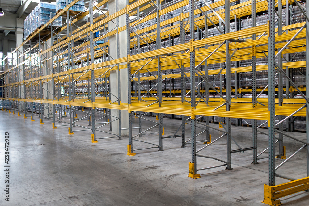 Metallic racks in warehouse Stock Photo | Adobe Stock