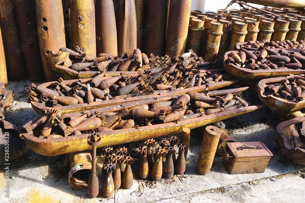 Photo & Art Print Rusted munitions, bomb housings and unexploded ...