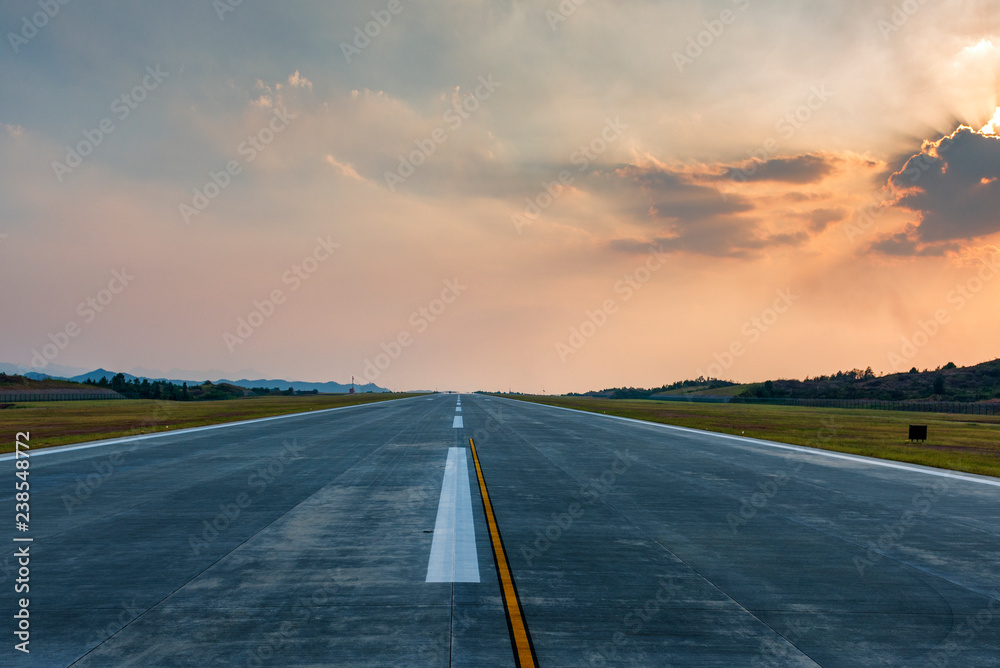 Runway, airstrip in the airport terminal with marking on blue sky with ...