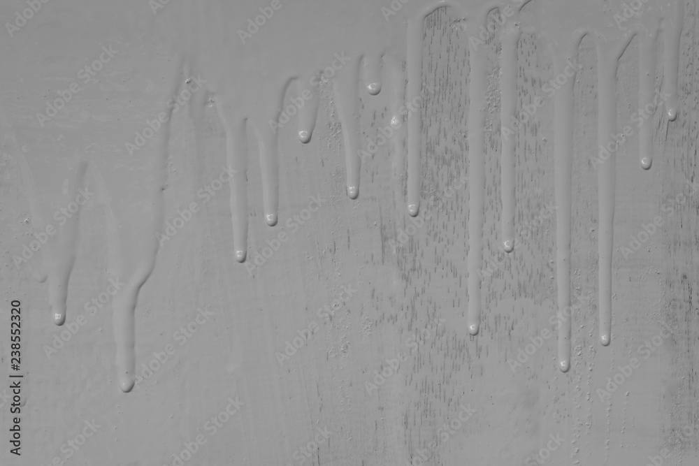 Wooden wall painting by white oil color paint with pouring drip texture ...