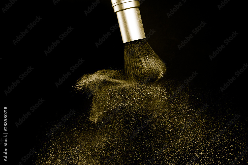 gold powder splash and brush for makeup artist or beauty blogger in ...