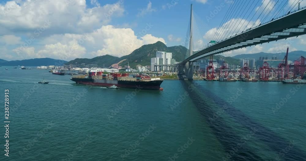 Cargo container ship entering the Hong Kong container terminal top view ...