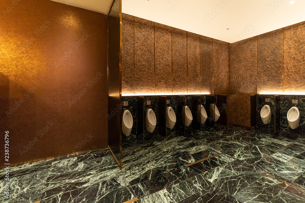 Row of modern urinals men public toilet room in public toilet, restroom ...