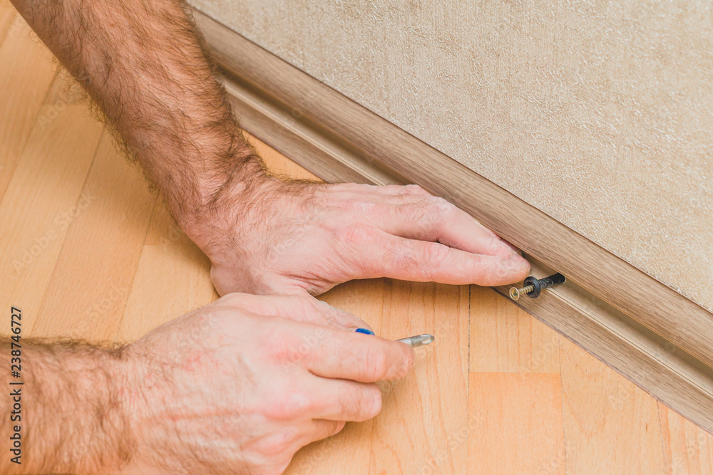 Technology of installation and installation of plastic floor plinth on ...