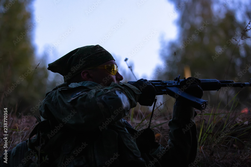 Sniper team armed with large caliber, sniper rifle, shooting enemy ...