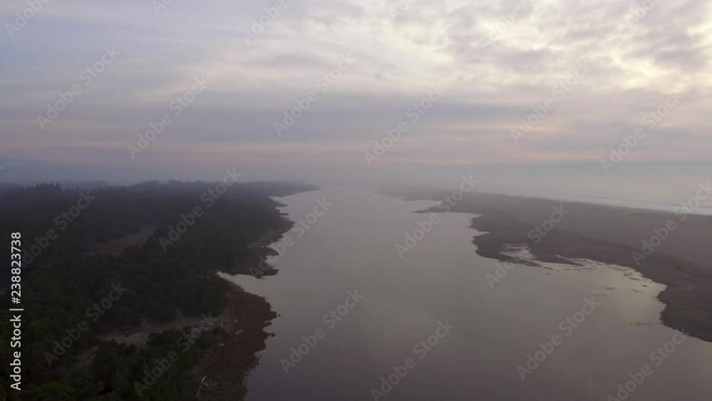 Drone footage flying over New River in Oregon. Running parallel to the ...