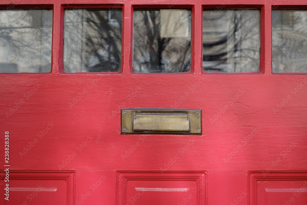 Brass letter drop on a beautiful restored door with multiple glass ...