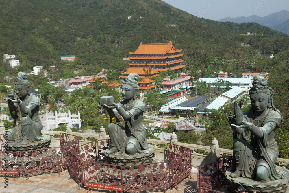 Color, daytime landscape photo of the Po Lin Monastery on Lantau Island ...