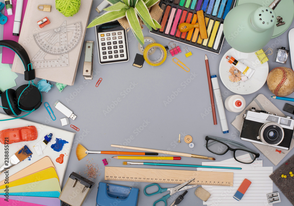 Top view messy creative retro desk Stock Photo | Adobe Stock