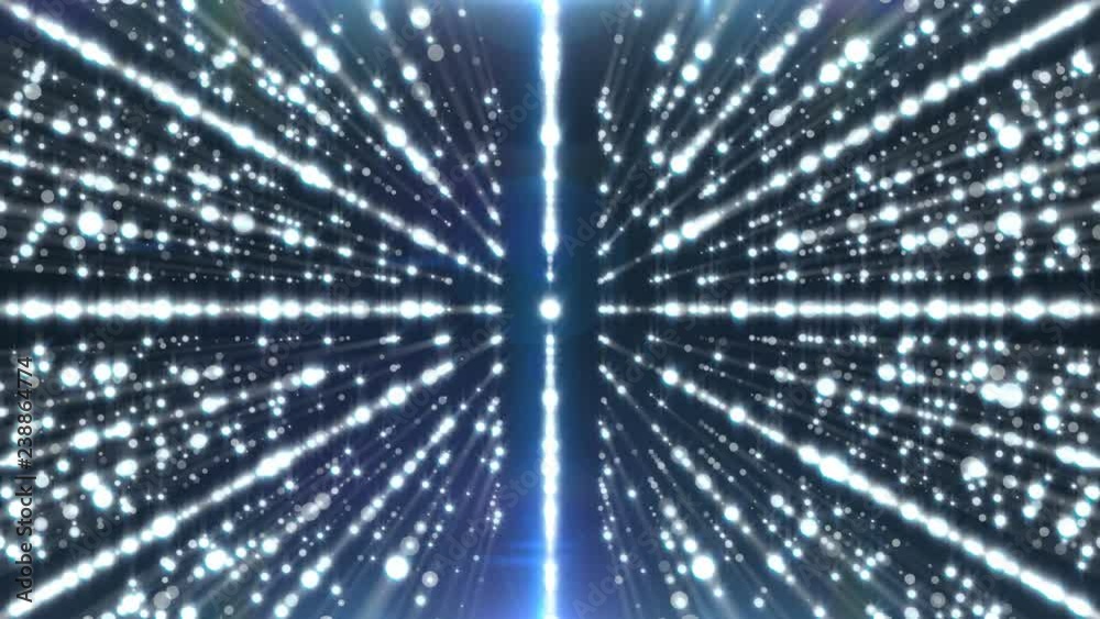 Silver glitter sparkles with blue light on dark background. Commercial ...