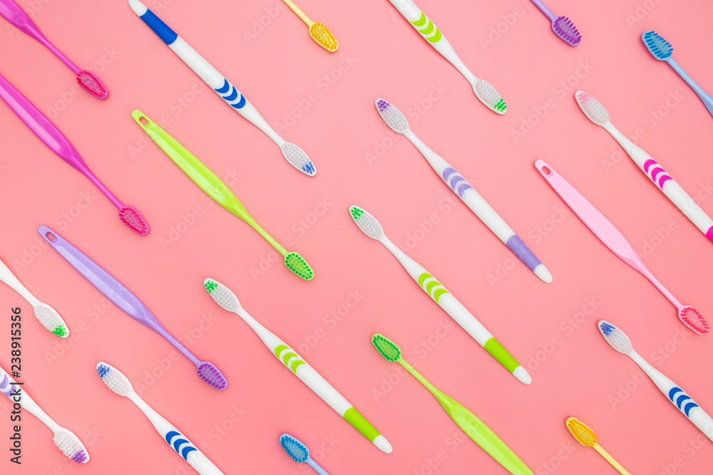 Top view of toothbrushes in colorful on pastel color background. Stock ...