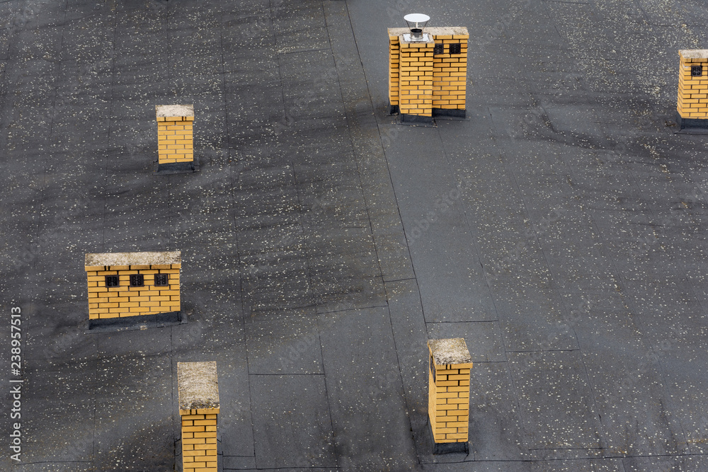 Top view of the roof of the house on which chimneys and ventilation ...