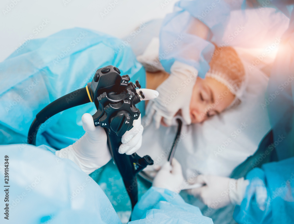 Endoscopy at the hospital. Doctor holding endoscope before gastroscopy ...