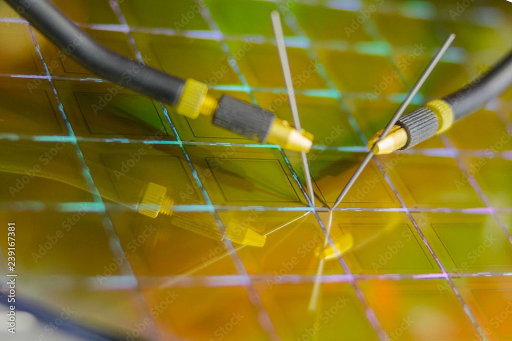 Checking microchips on silicon wafer with probe station.Microelecronics ...