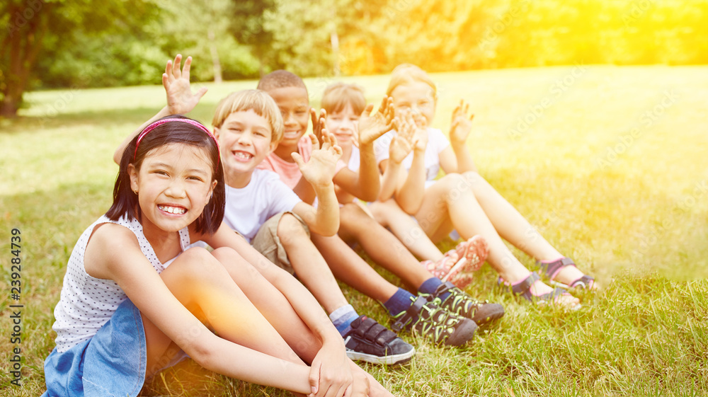 Multicultural group of kids smiling Stock Photo | Adobe Stock