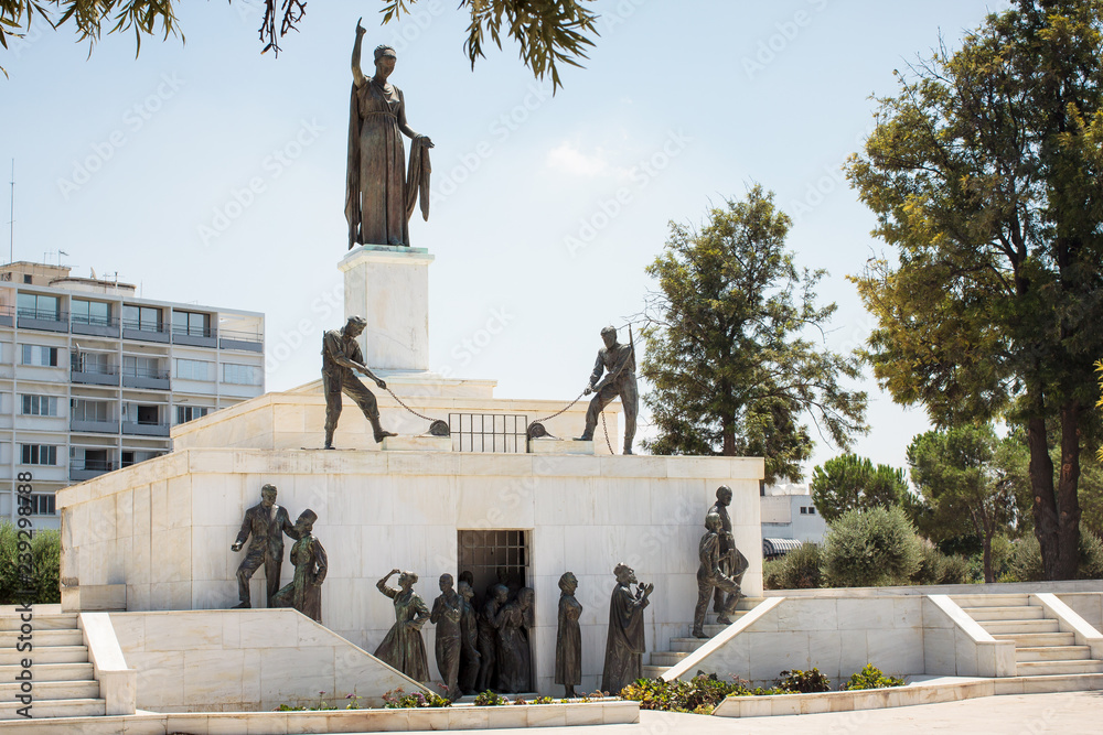 Monument of Freedom in Nicosia includes 14 black statues of prisoners ...