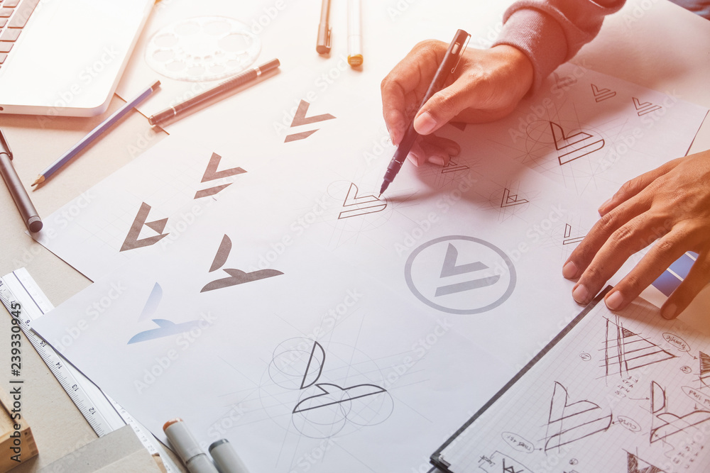 Graphic designer drawing sketch design creative Ideas draft Logo ...