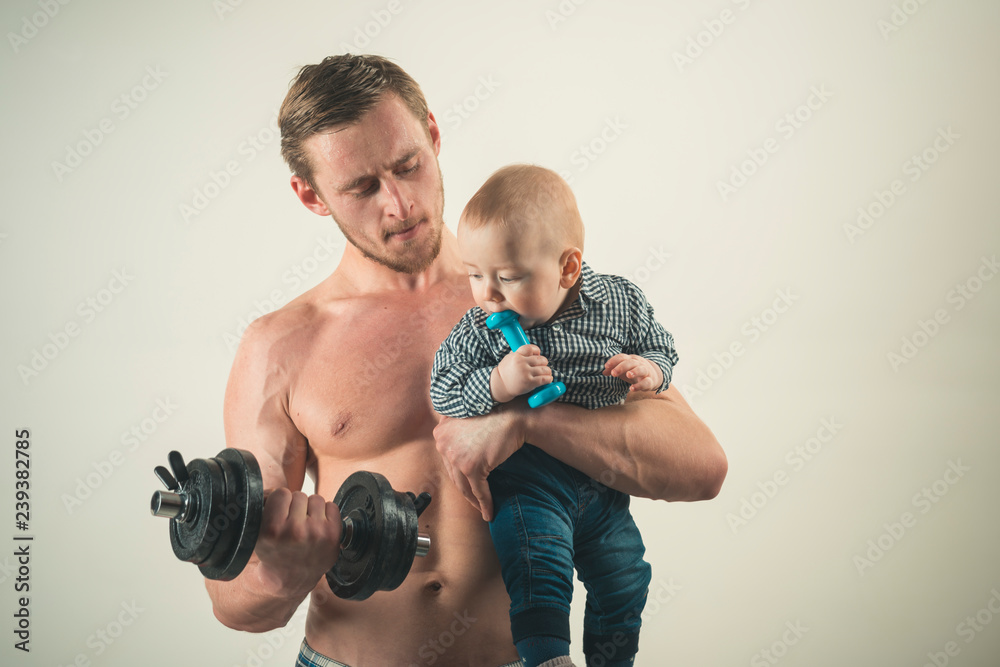 Healthy family lifestyle. Father and child training together. Strong ...