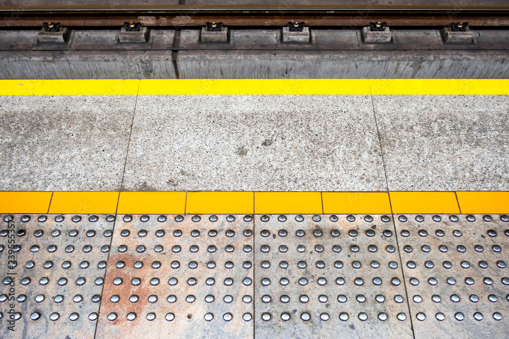tactile paving for visually impared at subway platform edge. yel Stock ...