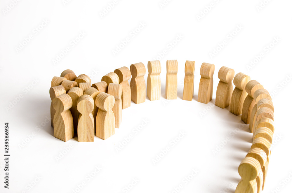 A large group of wooden figures of people increases from the queue ...