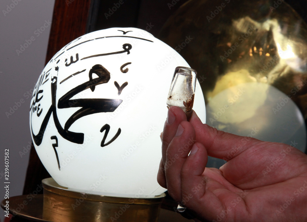 Prayer leader (imam) showing Prophet Mohammad’s Beard at Arap Mosque in ...