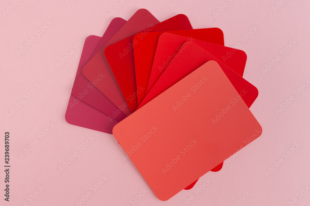 Color swatches sample cards spread in fan shape - hues of red with copy ...