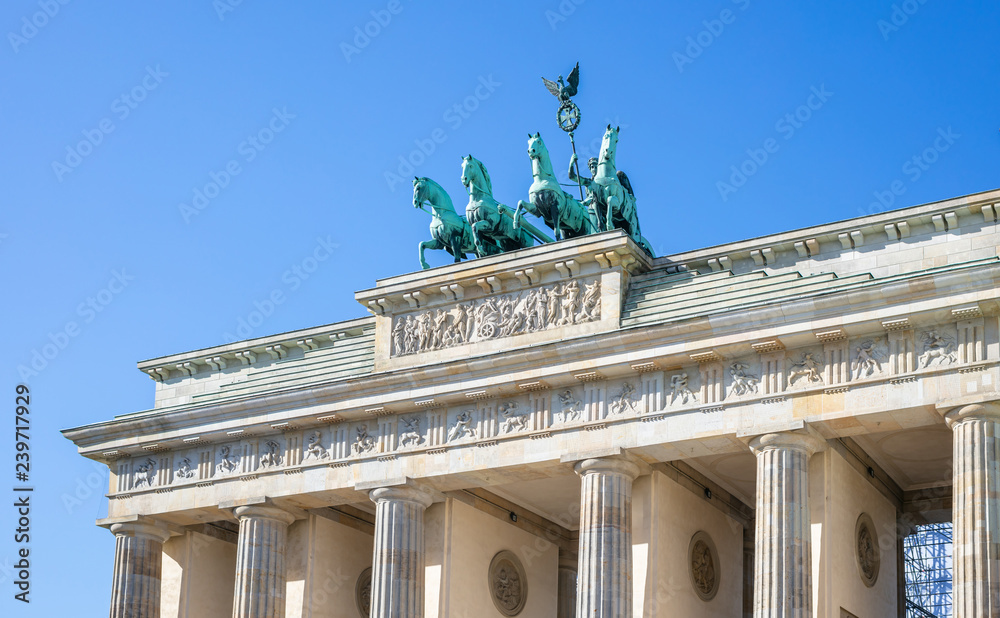 Brandenburg Gate In Berlin. Historic symbol in Germany. Clear blue sky ...