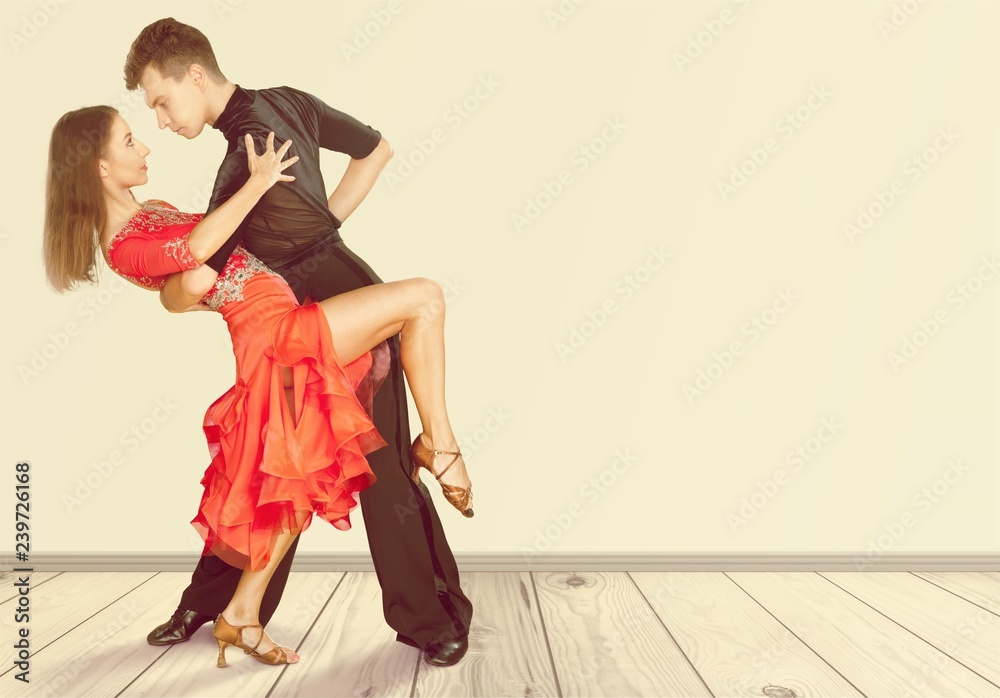 Man and a woman dancing Salsa on background Stock-Foto | Adobe Stock