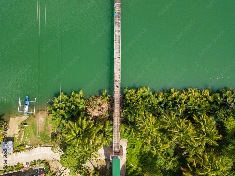 Aerial top view to bridge over Loboc river, Bohol island, Philippines ...
