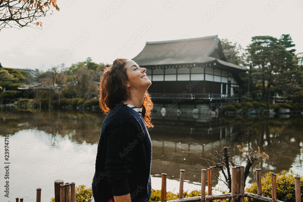 .Young occidental woman discovering the nipon country. Tourism in the ...