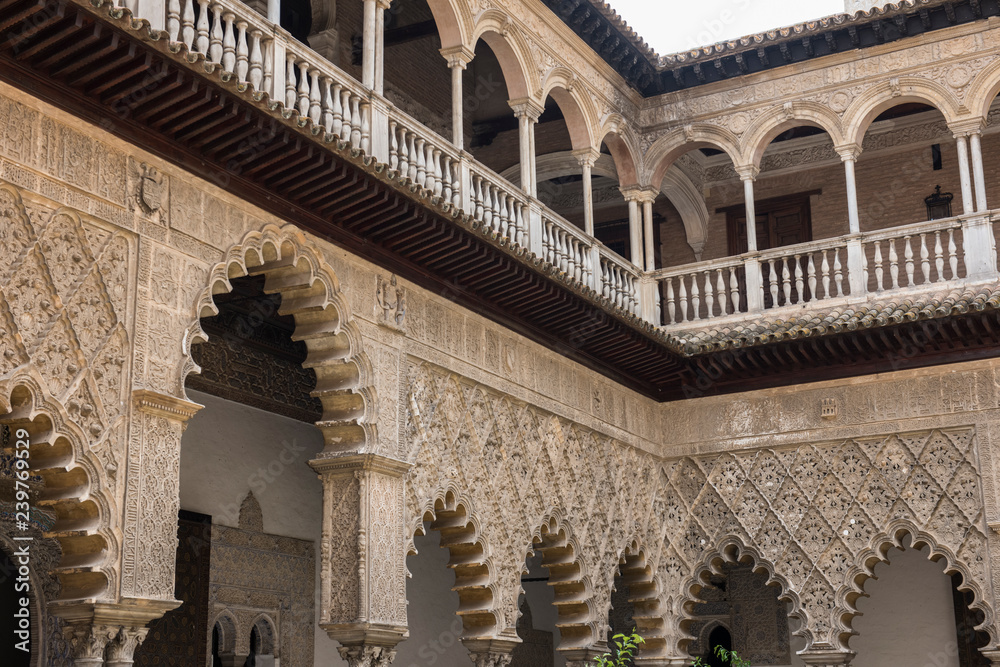 Beautiful architecture of the famous Alcazar of Seville Royal Palace ...