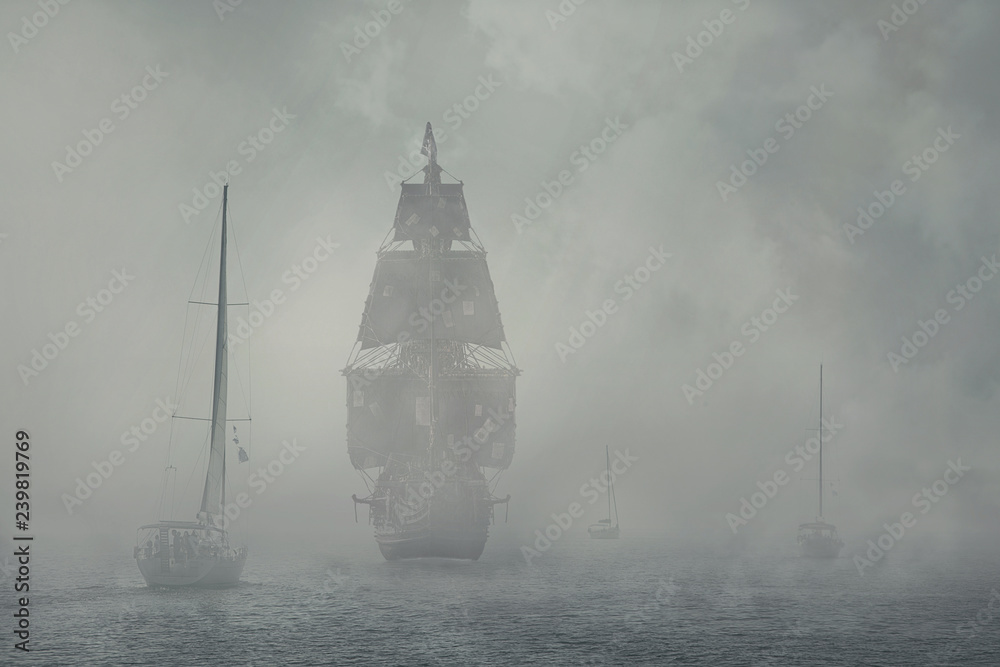 Yachts and a pirate ship in the fog. Stock Photo | Adobe Stock