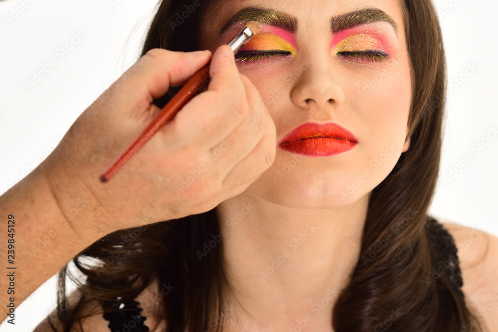 Perfect makeup. Makeup artist apply creative makeup for pretty woman ...