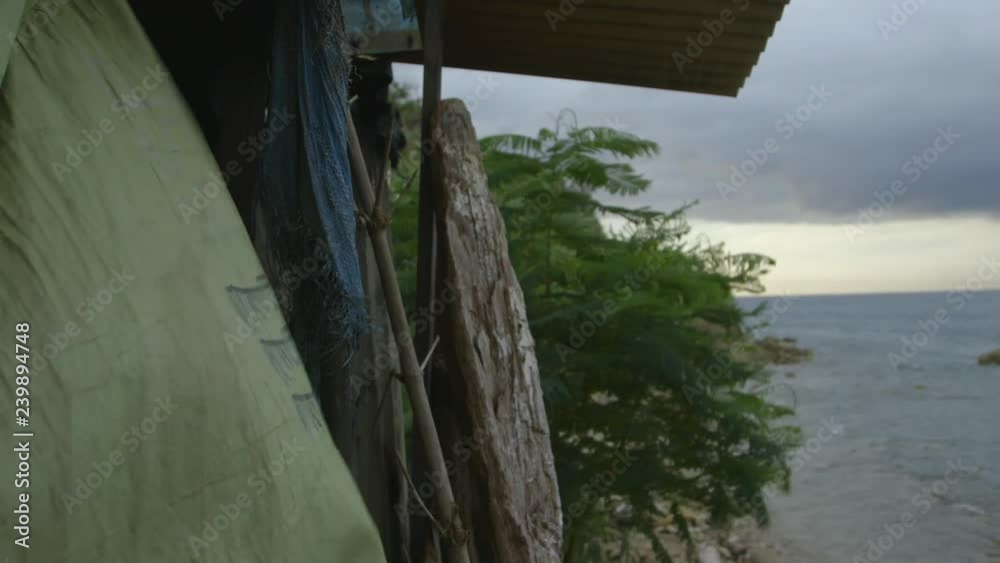 Extreme close-up shot of an iron sheet-roofed shanty structure at ...